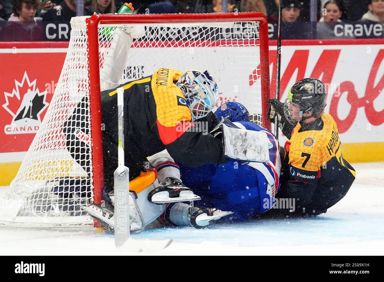 USA forward Danny Nelson (17) and Germany defenceman Carlos Handel (7 ...