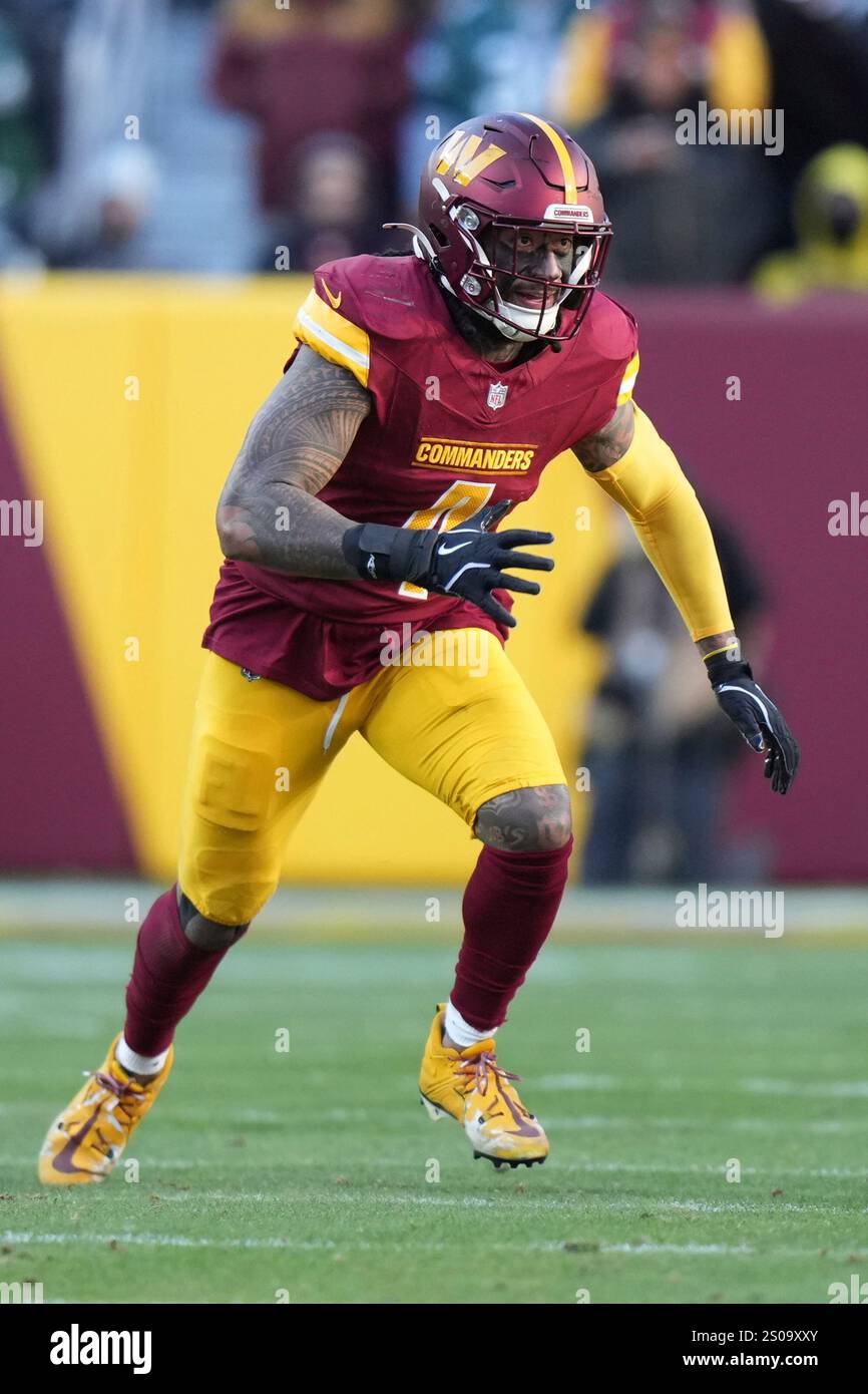 Washington Commanders linebacker Frankie Luvu (4) rushes the passer ...
