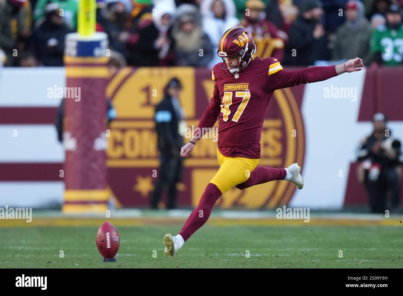 Washington Commanders place kicker Zane Gonzalez (47) kicks off during ...