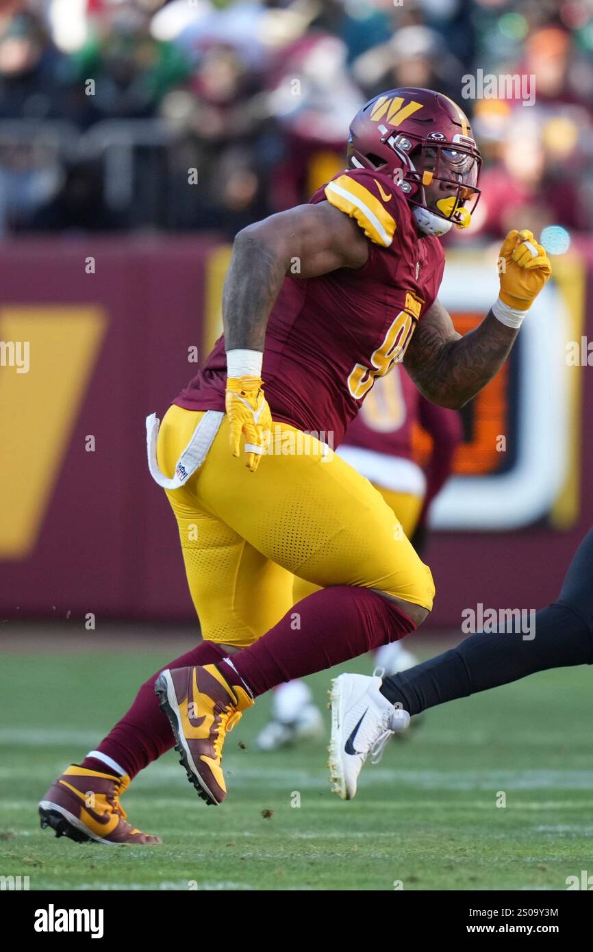Washington Commanders defensive tackle Daron Payne (94) tries to run ...