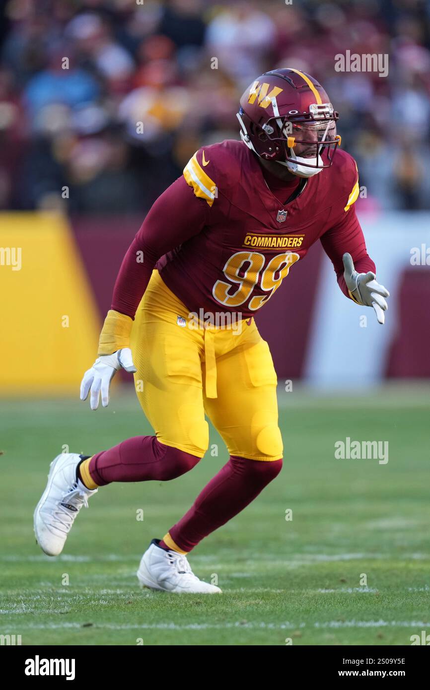 Washington Commanders defensive end Clelin Ferrell (99) rushes the ...