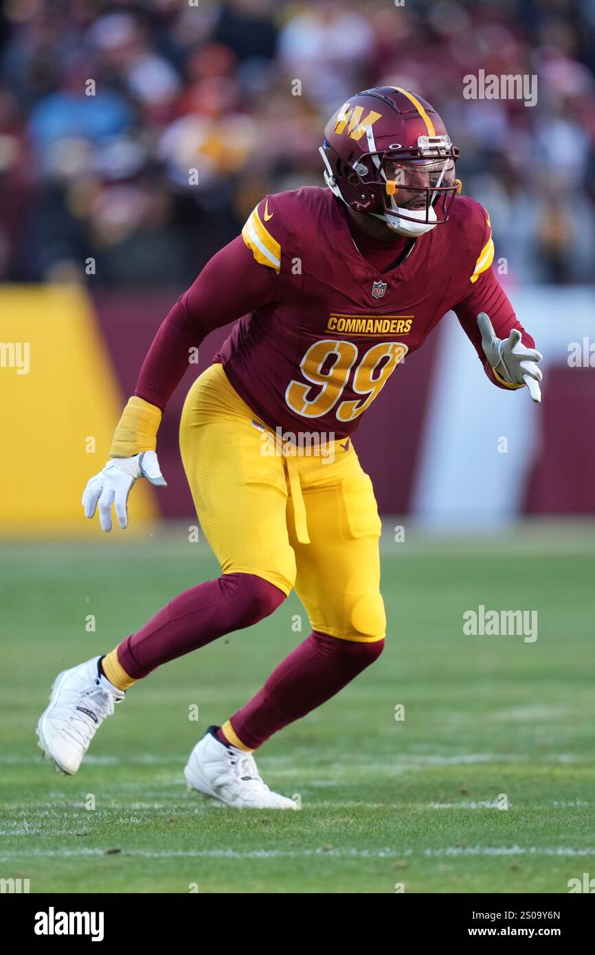 Washington Commanders defensive end Clelin Ferrell (99) rushes the ...