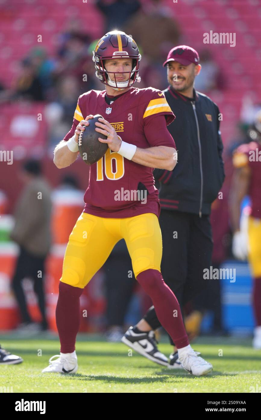 Washington Commanders quarterback Jeff Driskel (16) warms up before an ...