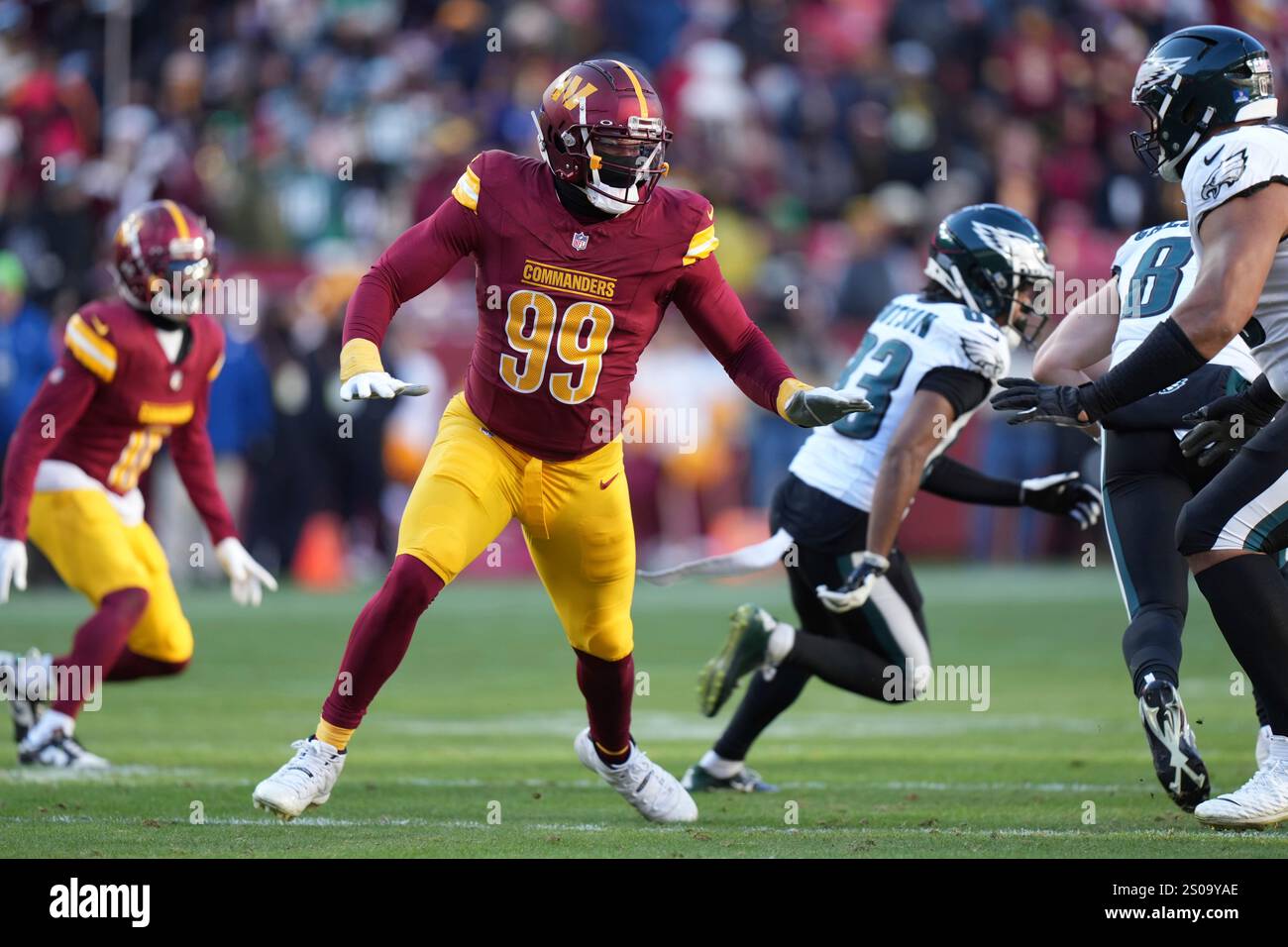 Washington Commanders defensive end Clelin Ferrell (99) rushes the ...