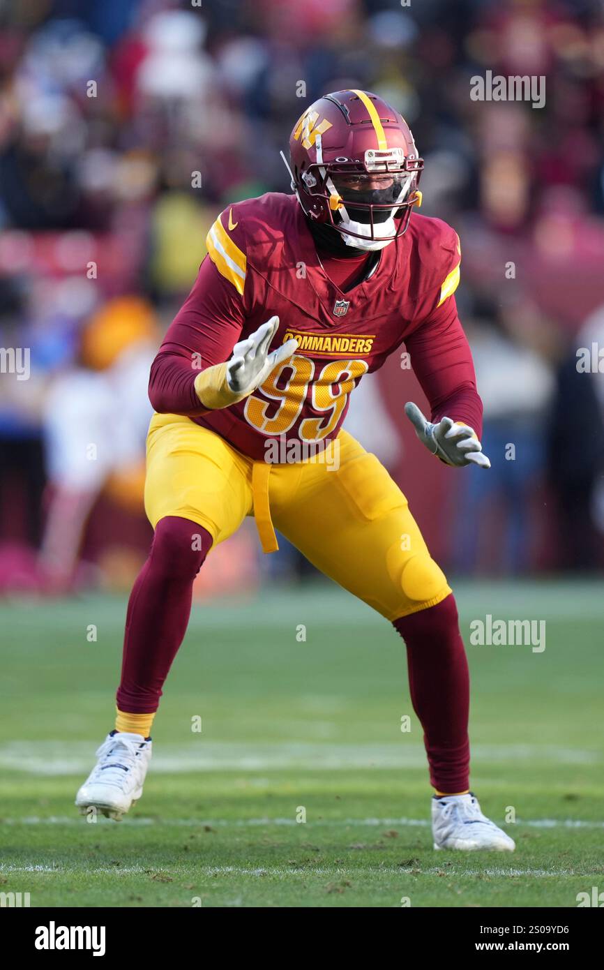 Washington Commanders defensive end Clelin Ferrell (99) rushes the ...