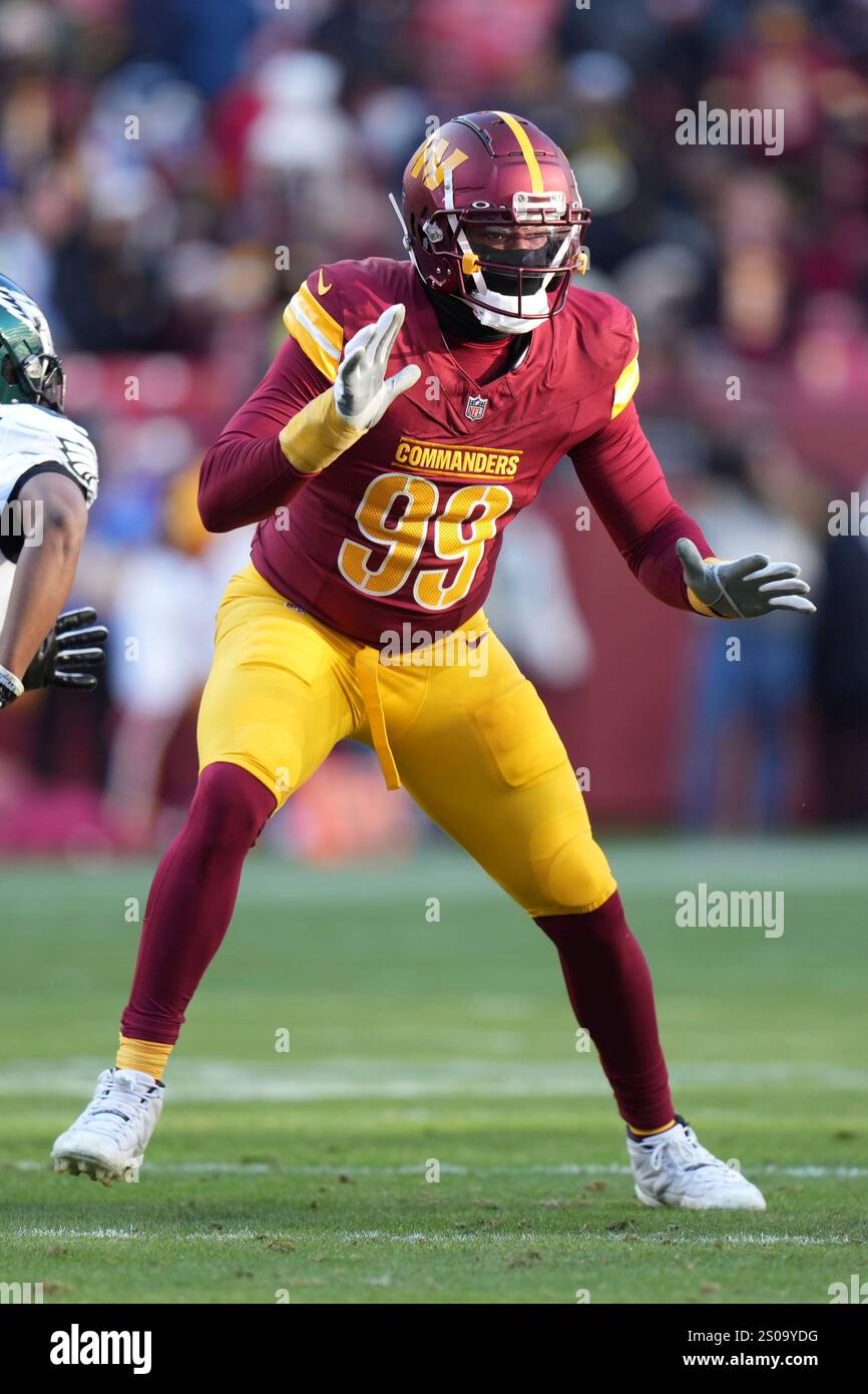 Washington Commanders defensive end Clelin Ferrell (99) rushes the ...
