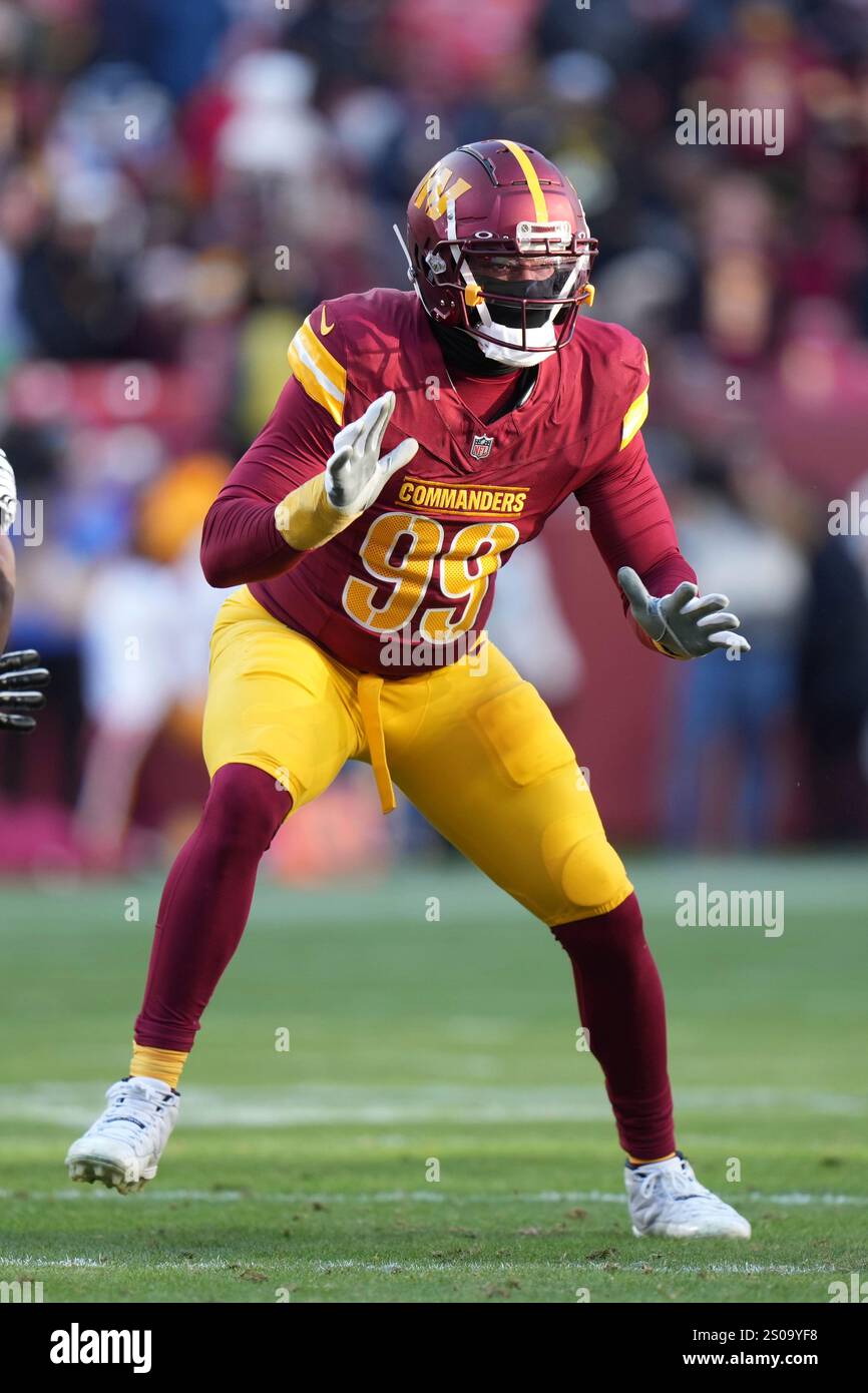 Washington Commanders defensive end Clelin Ferrell (99) rushes the ...