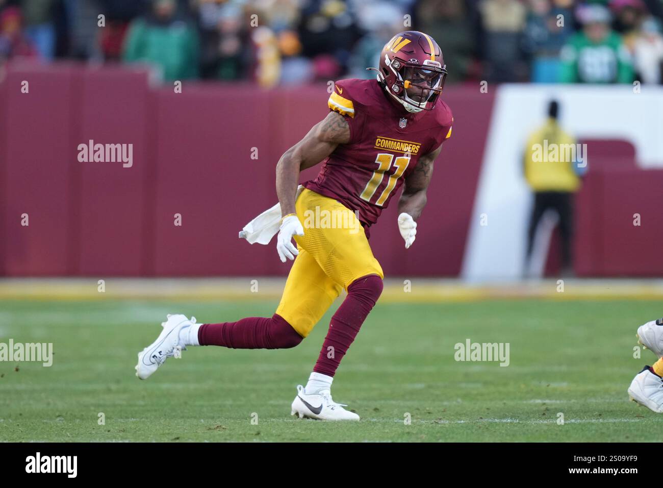 Washington Commanders safety Jeremy Chinn (11) runs to the ball carrier ...