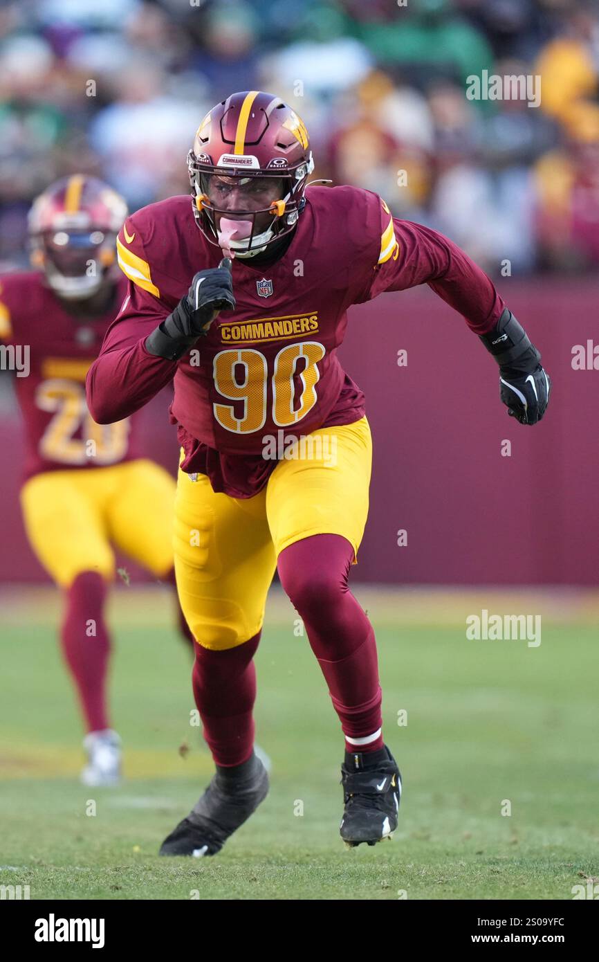 Washington Commanders defensive end Javontae Jean-Baptiste (90) rushes ...