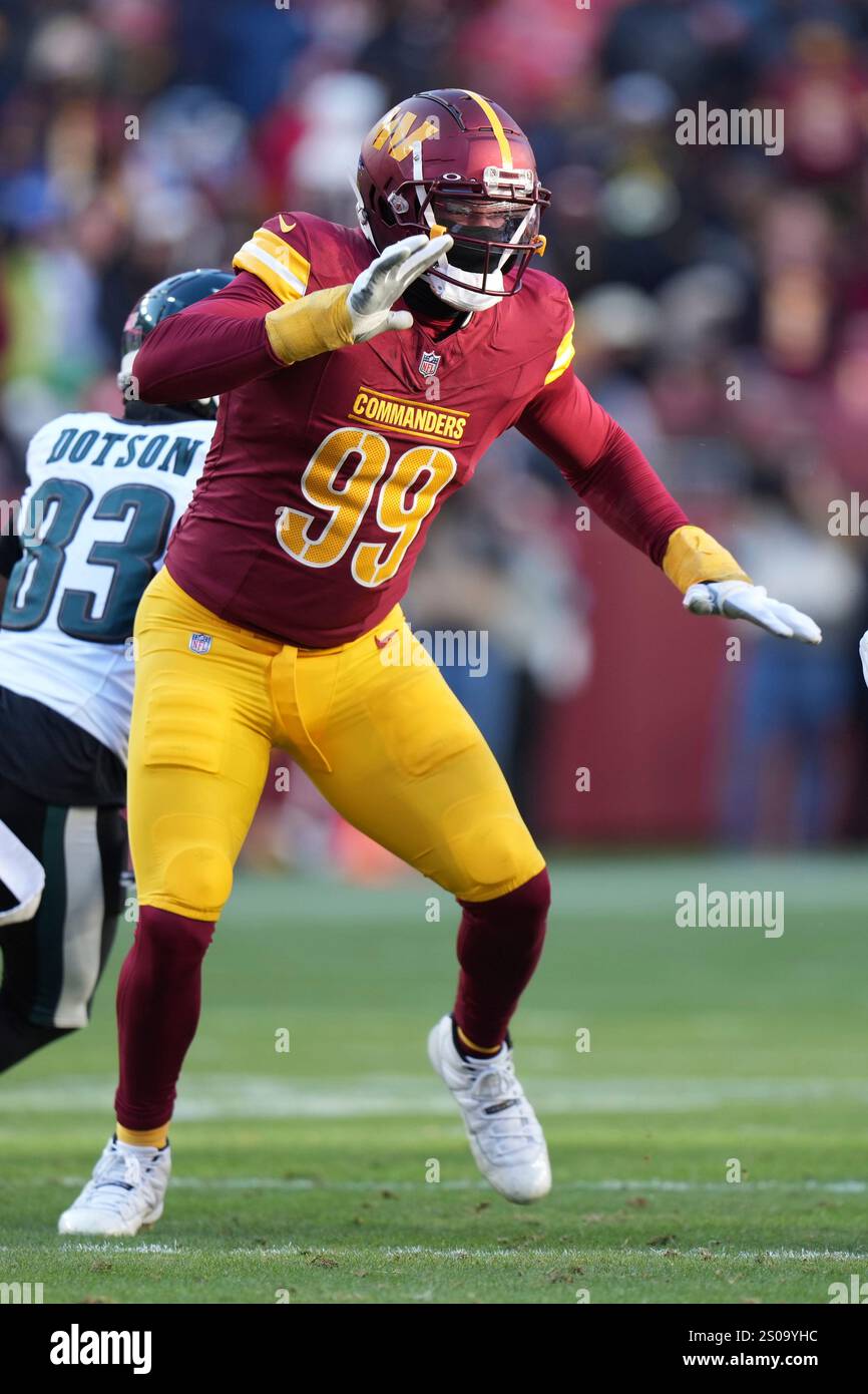 Washington Commanders defensive end Clelin Ferrell (99) rushes the ...