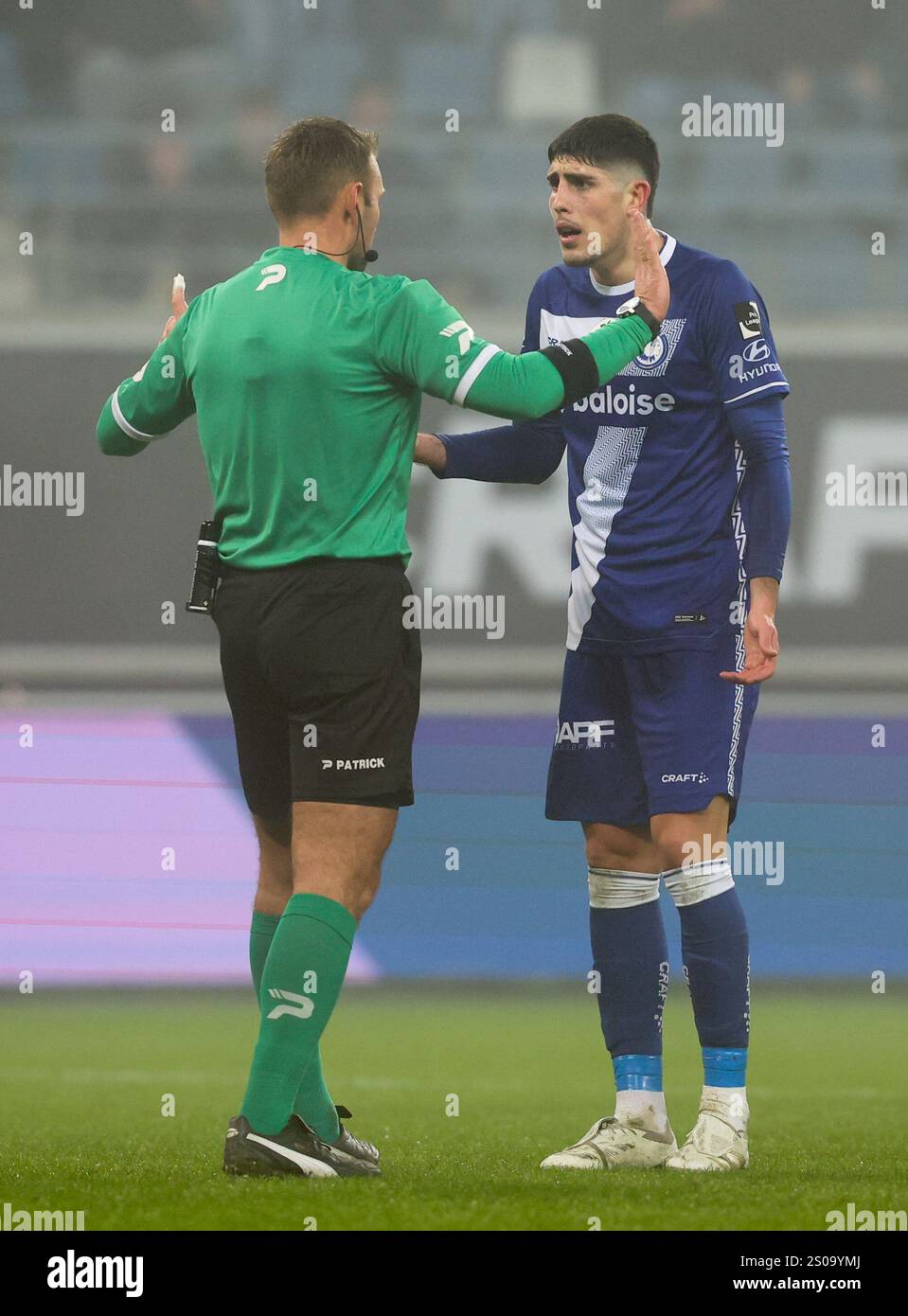 Gent, Belgium. 26th Dec, 2024. referee Nicolas Laforge and Gent's Omri ...