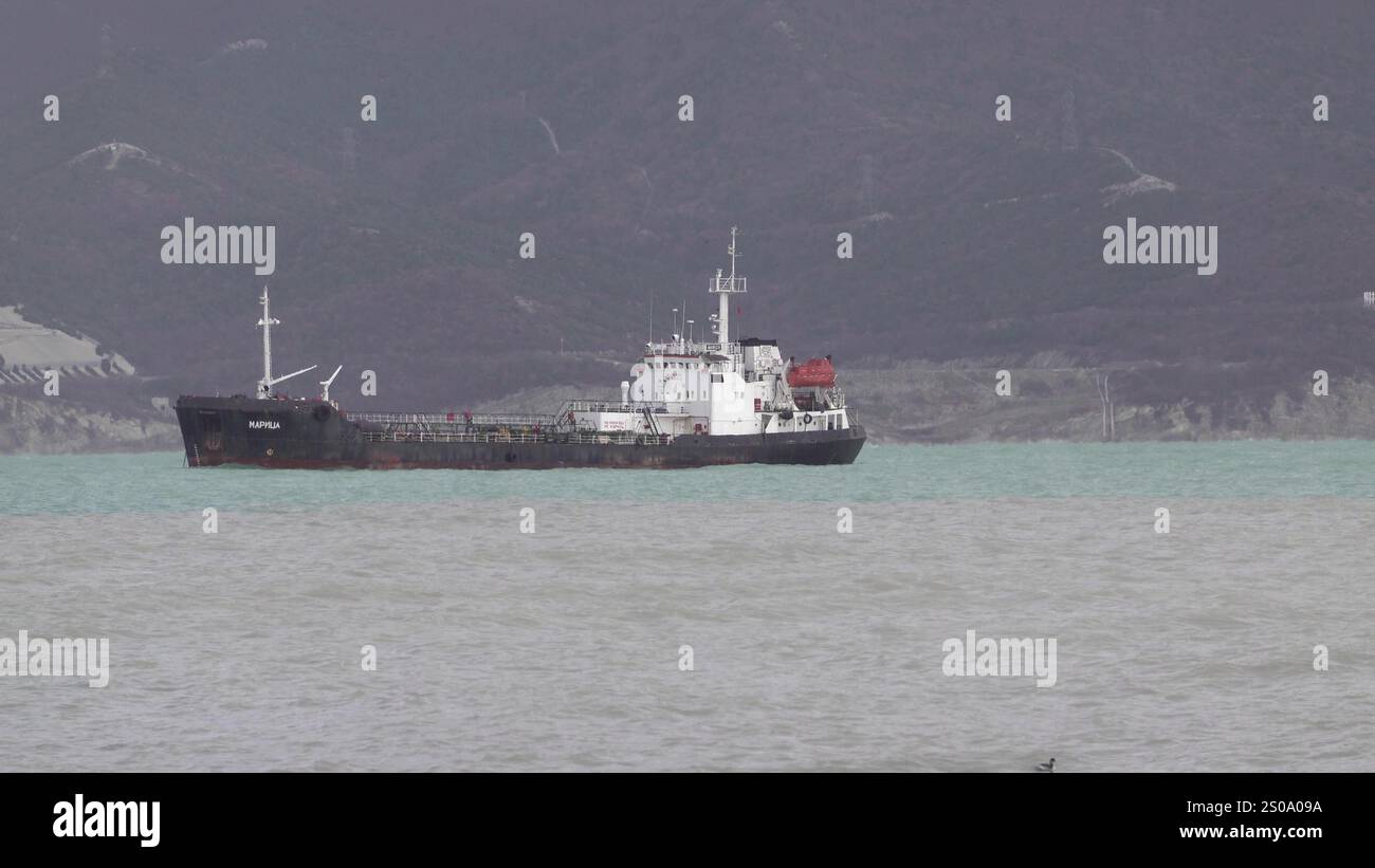 Sea freighter sailing in the middle of the ocean with big waves Stock ...