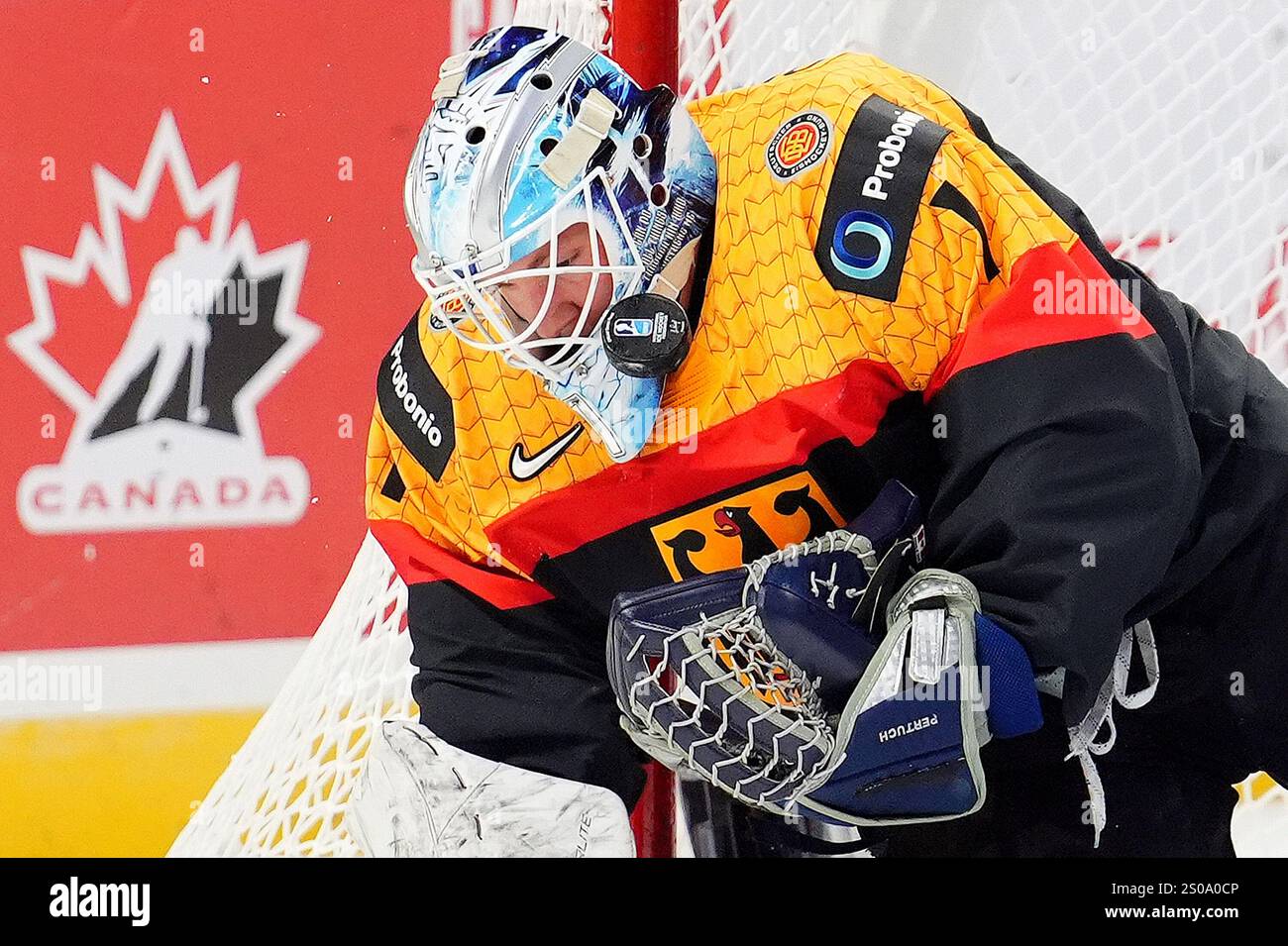 Germany goaltender Nico Pertuch (1) makes a save during first period ...