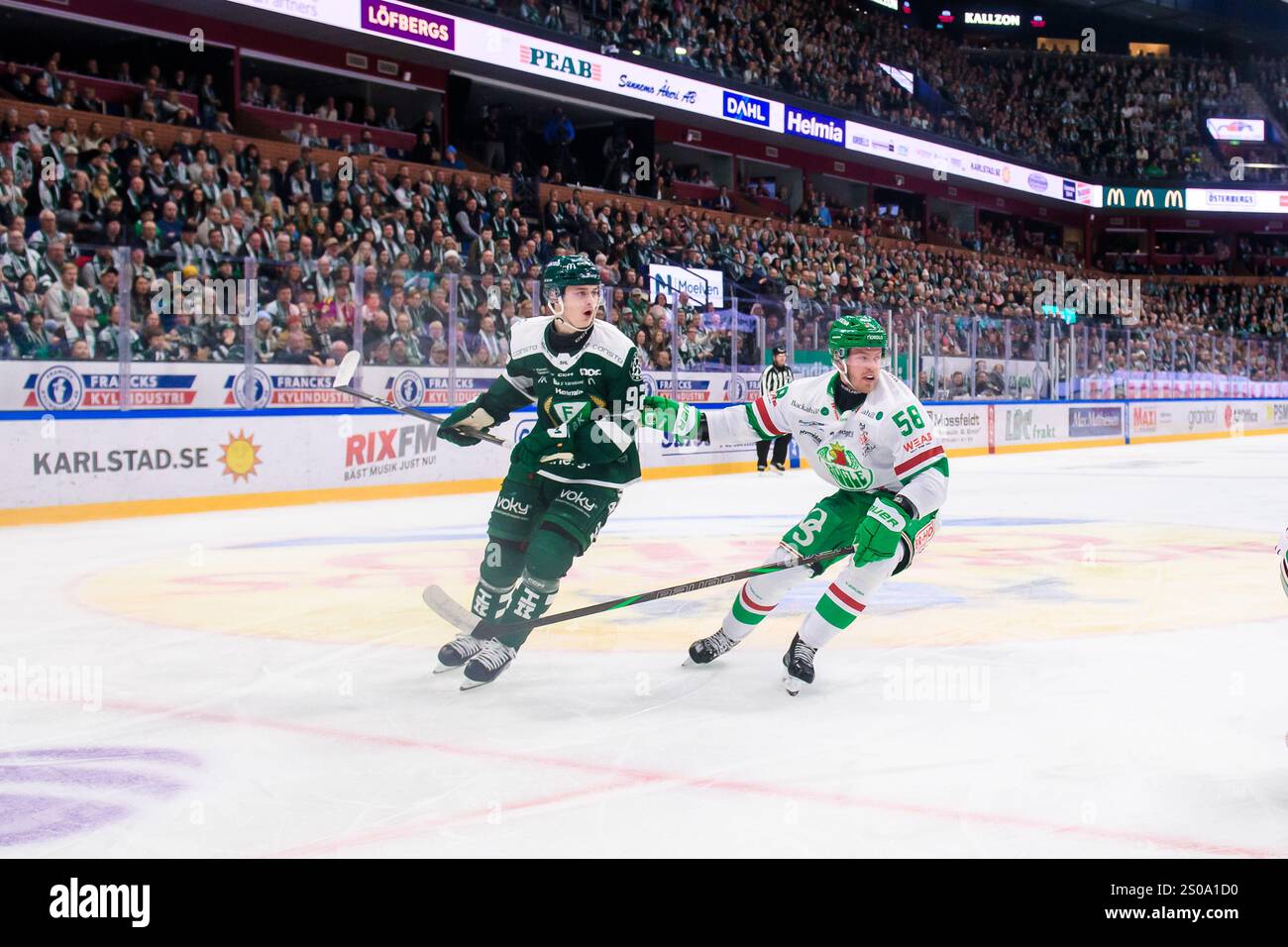Karlstad, Sverige. 26th Dec, 2024. 241226 Färjestads Lucas Forsell och ...