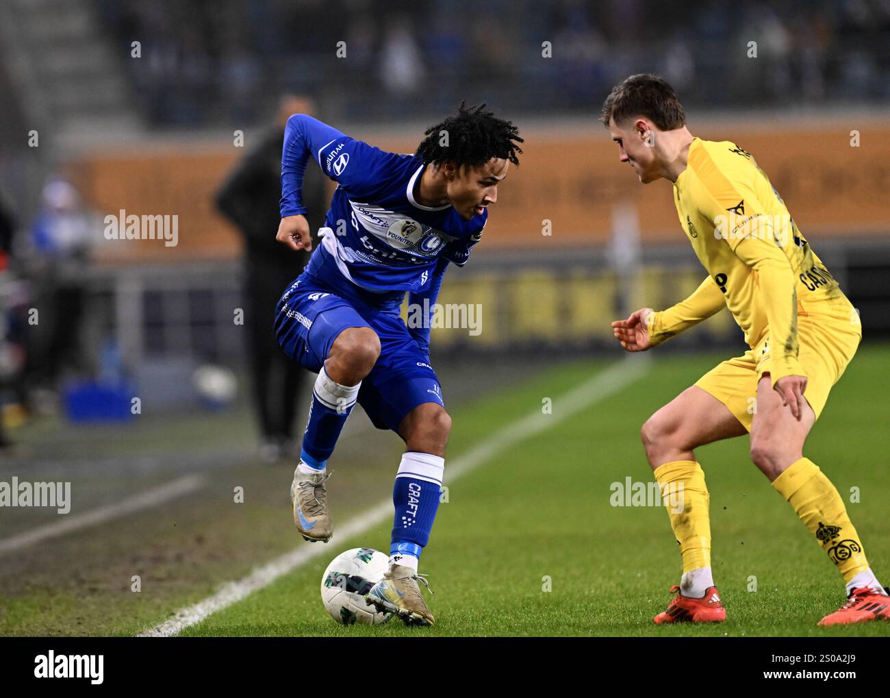 Gent, Belgium. 26th Dec, 2024. Gent's Momodou Lamin Sonko and Gent's ...