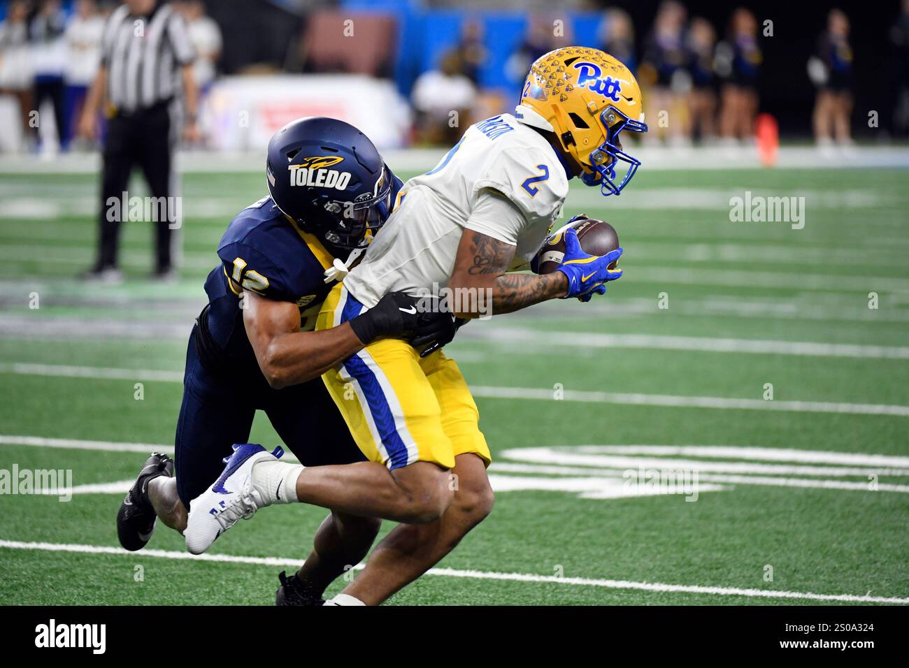 Pittsburgh wide receiver Kenny Johnson, right, makes a catch and is ...