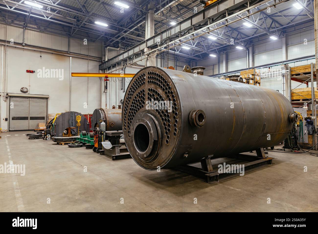 Assembly line of boiler equipment Stock Photo - Alamy