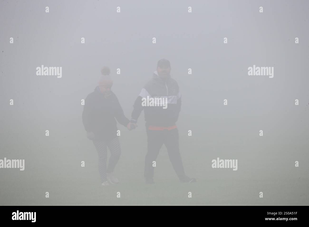 St Enda's Park, Dublin, Ireland - December 26th 2024 - People walk ...