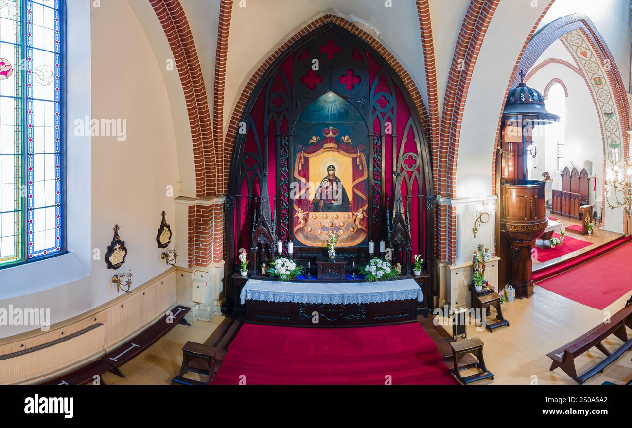 The image shows a church interior with a decorated altar, Gothic arches ...
