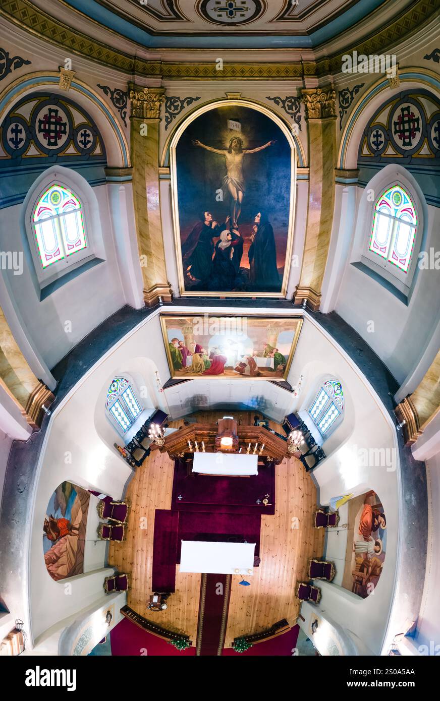 The image shows an aerial view of a cathedral's interior, featuring ...