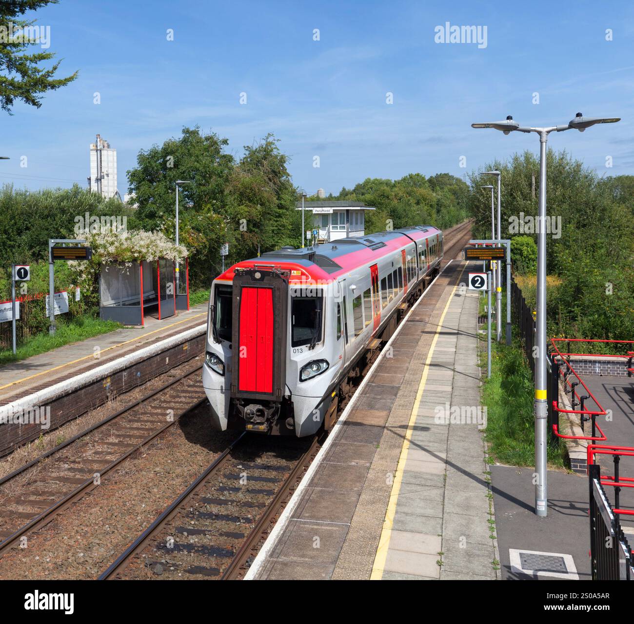 Transport For Wales CAF built class 197 train 197013 running on the ...