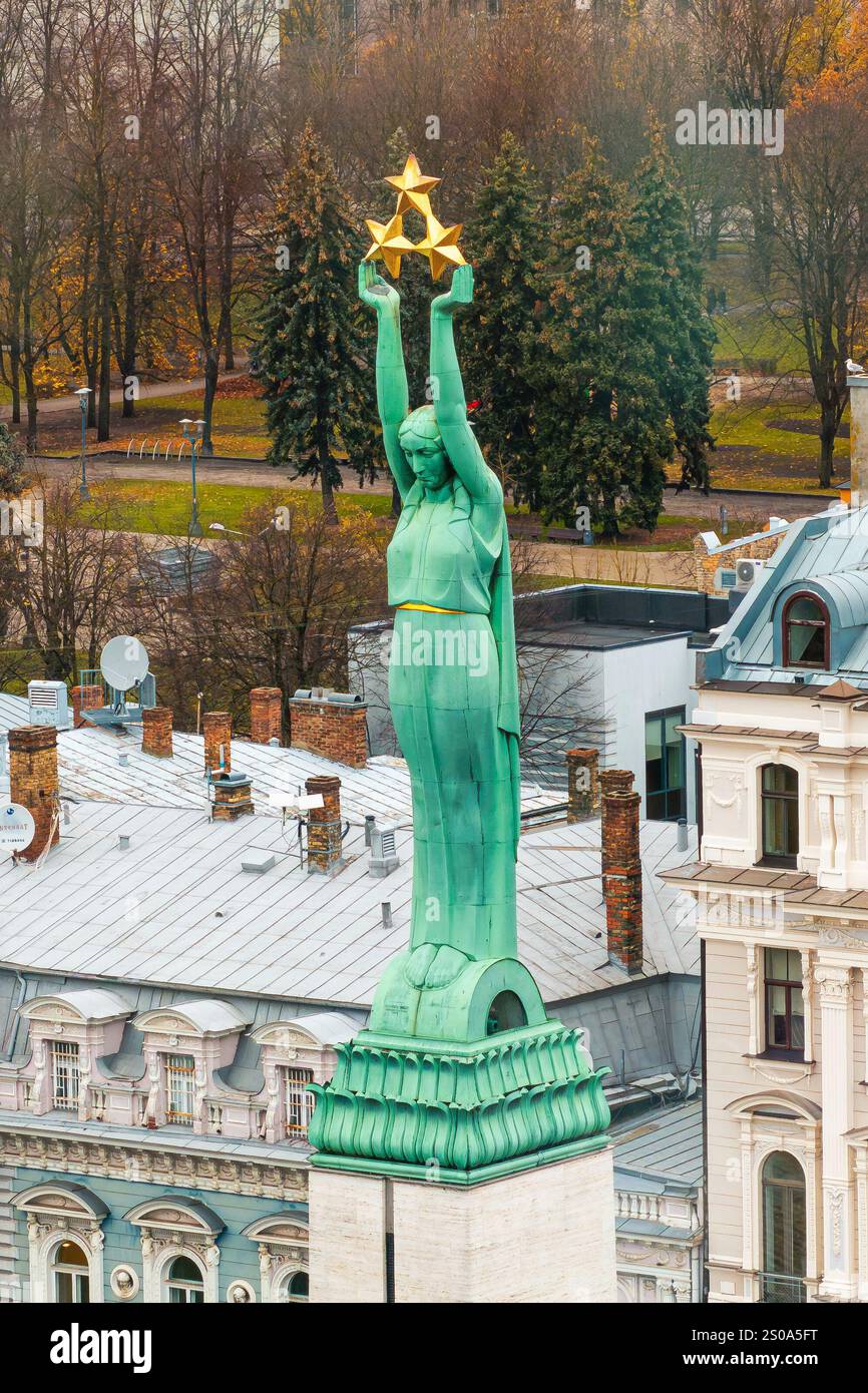 The Freedom Monument in Riga, Latvia, stands tall with a copper figure ...