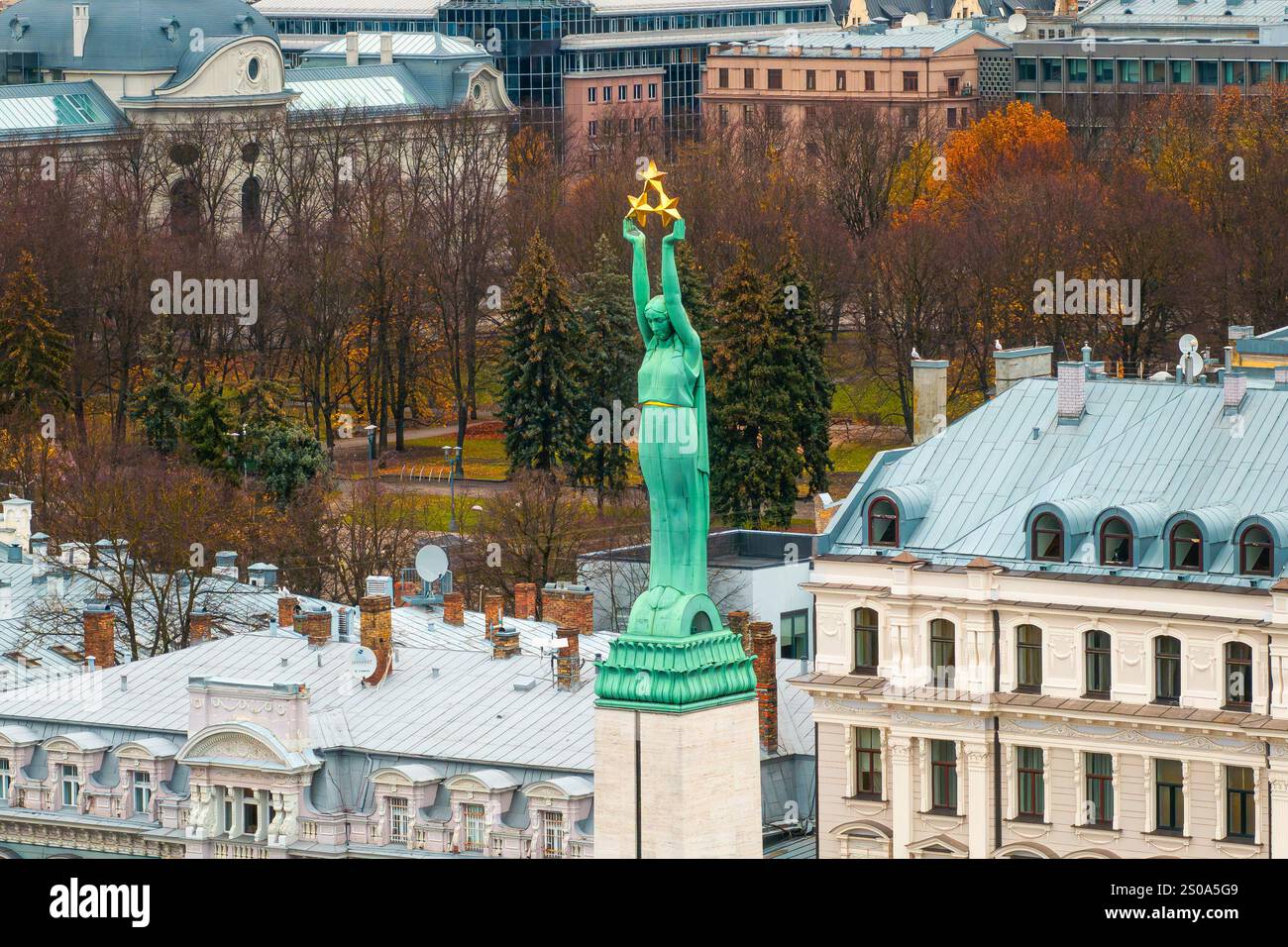 The Freedom Monument in Riga, Latvia, stands tall with Liberty holding ...