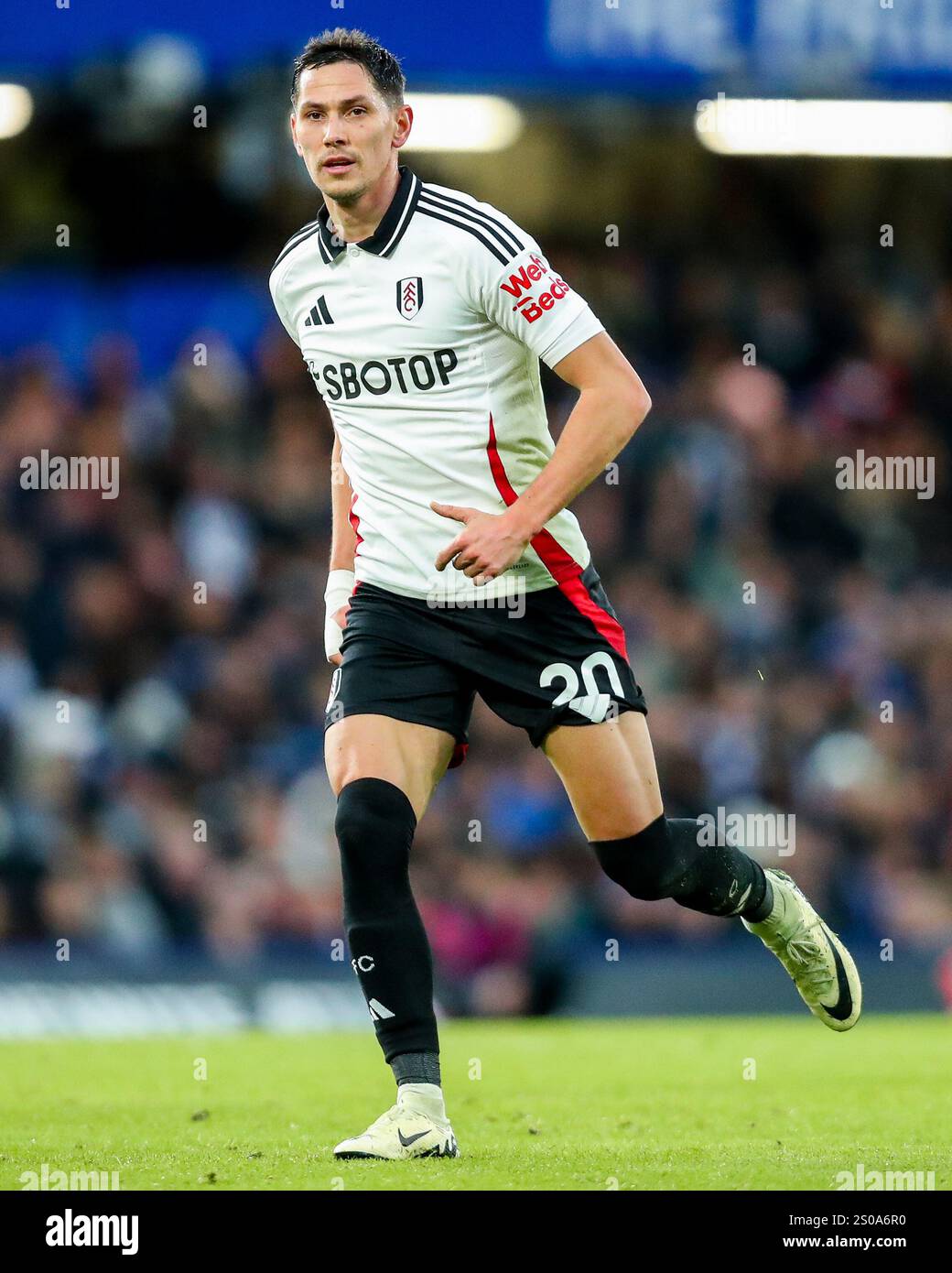 Sasa Lukic of Fulham in action during the Premier League match Chelsea ...
