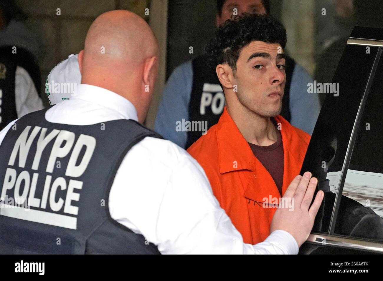 Luigi Nicholas Mangione leaves the Blair County Courthouse in ...