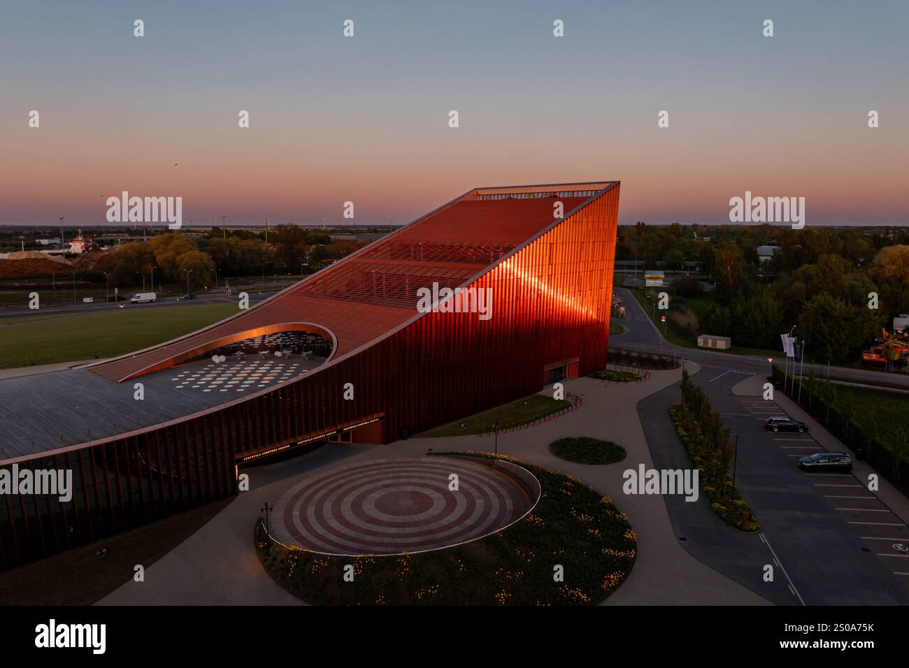 Ventspils Concert Hall Latvija in Latvia features a vibrant red ...