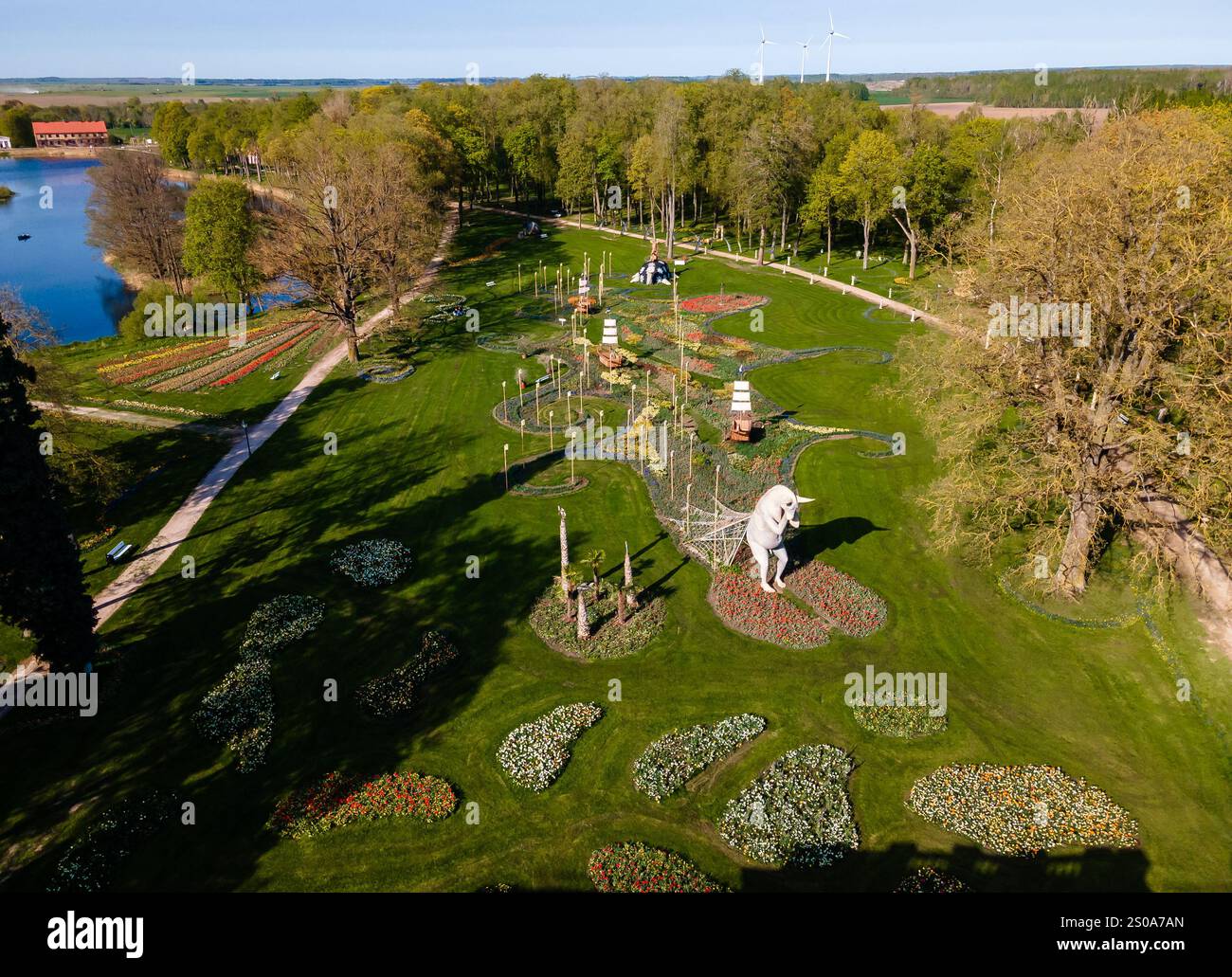 Pakruojis Manor in Lithuania features vibrant tulip beds, an elephant ...