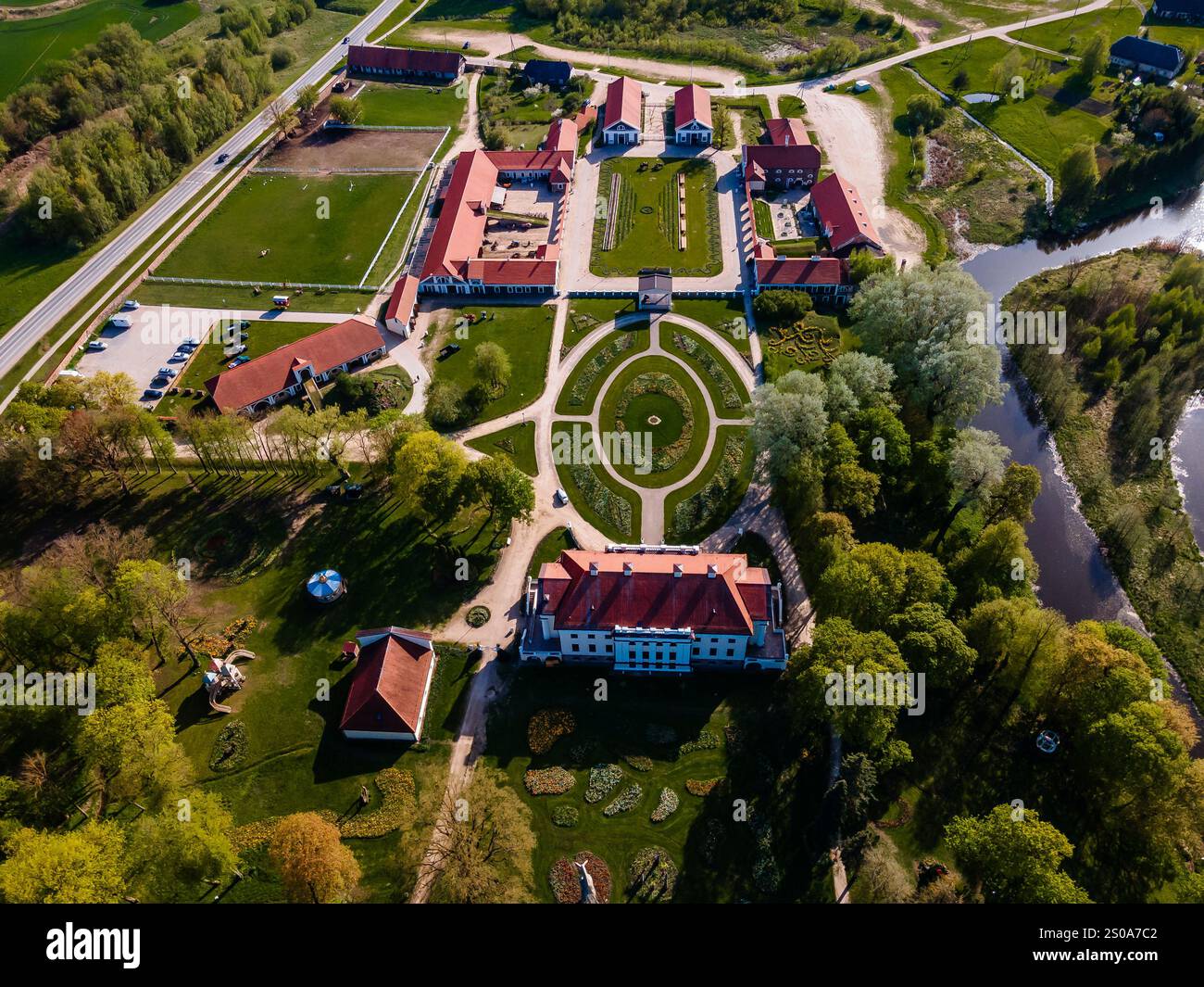An aerial perspective of Pakruojis Manor in Lithuania, featuring red ...