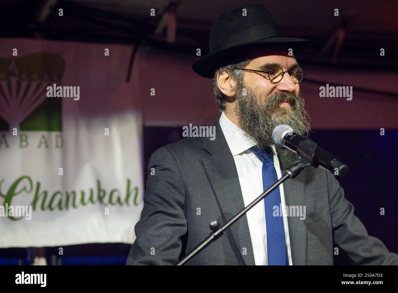 Rabbi Motte Wilhelm led the gathering. Hundreds of people celebrated ...