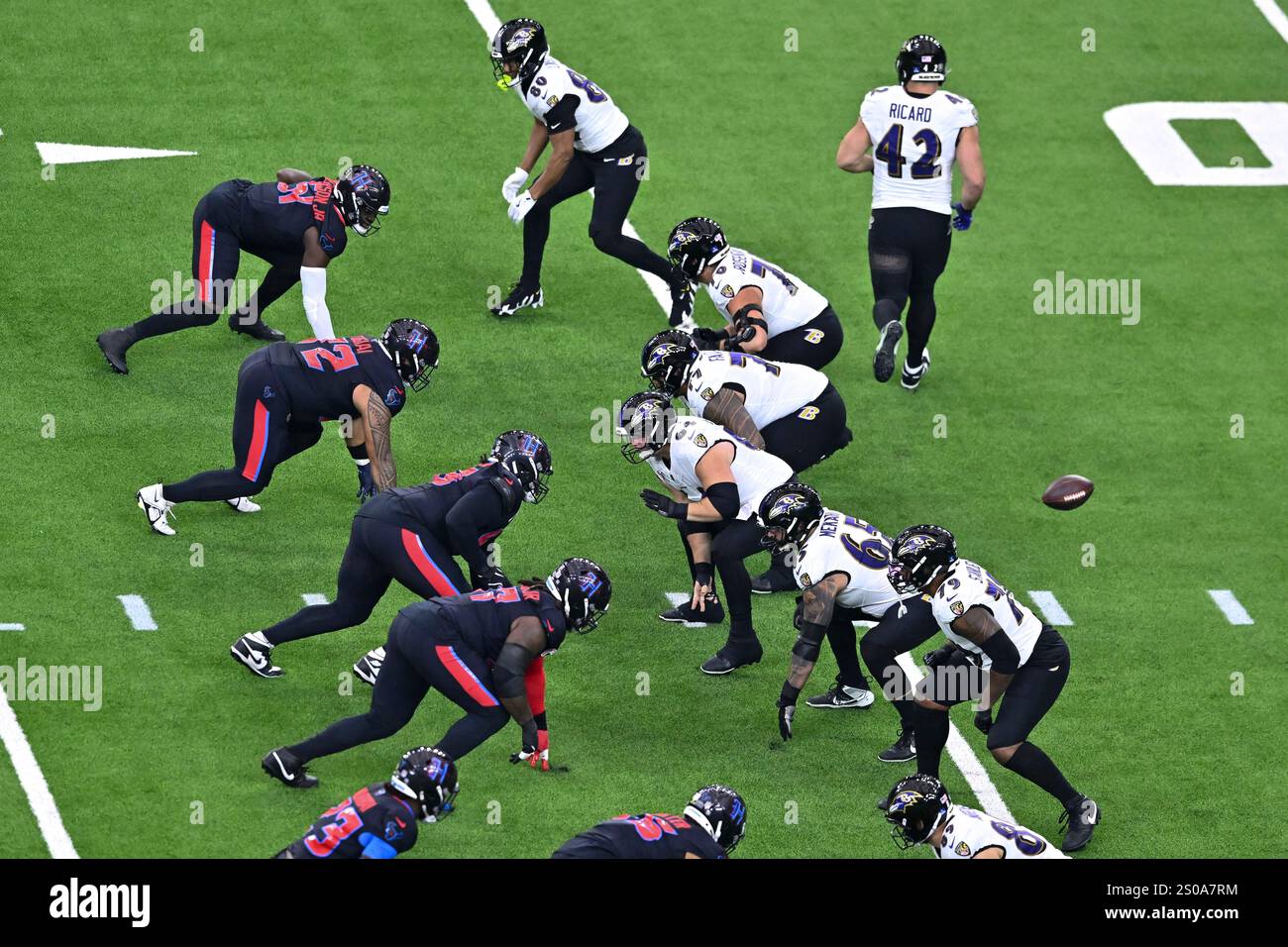 Baltimore Ravens center Tyler Linderbaum (64) snaps the ball during the ...