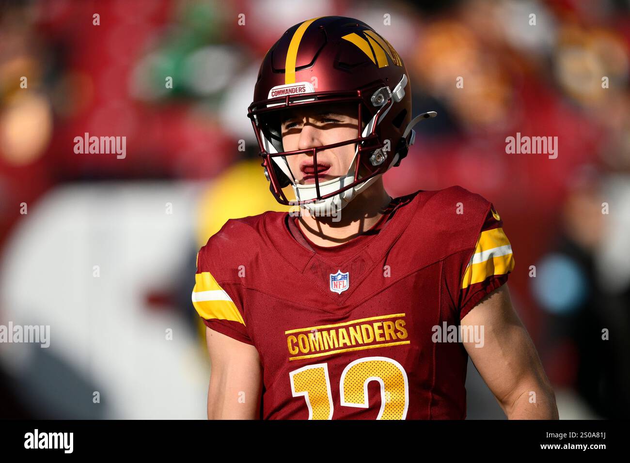 Washington Commanders wide receiver Luke McCaffrey (12) works out ...