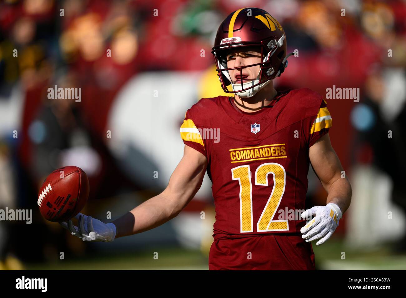 Washington Commanders wide receiver Luke McCaffrey (12) works out ...