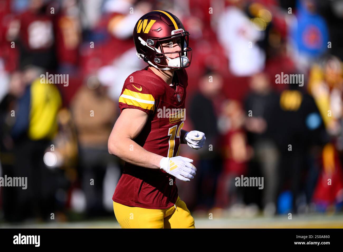 Washington Commanders wide receiver Luke McCaffrey (12) works out ...