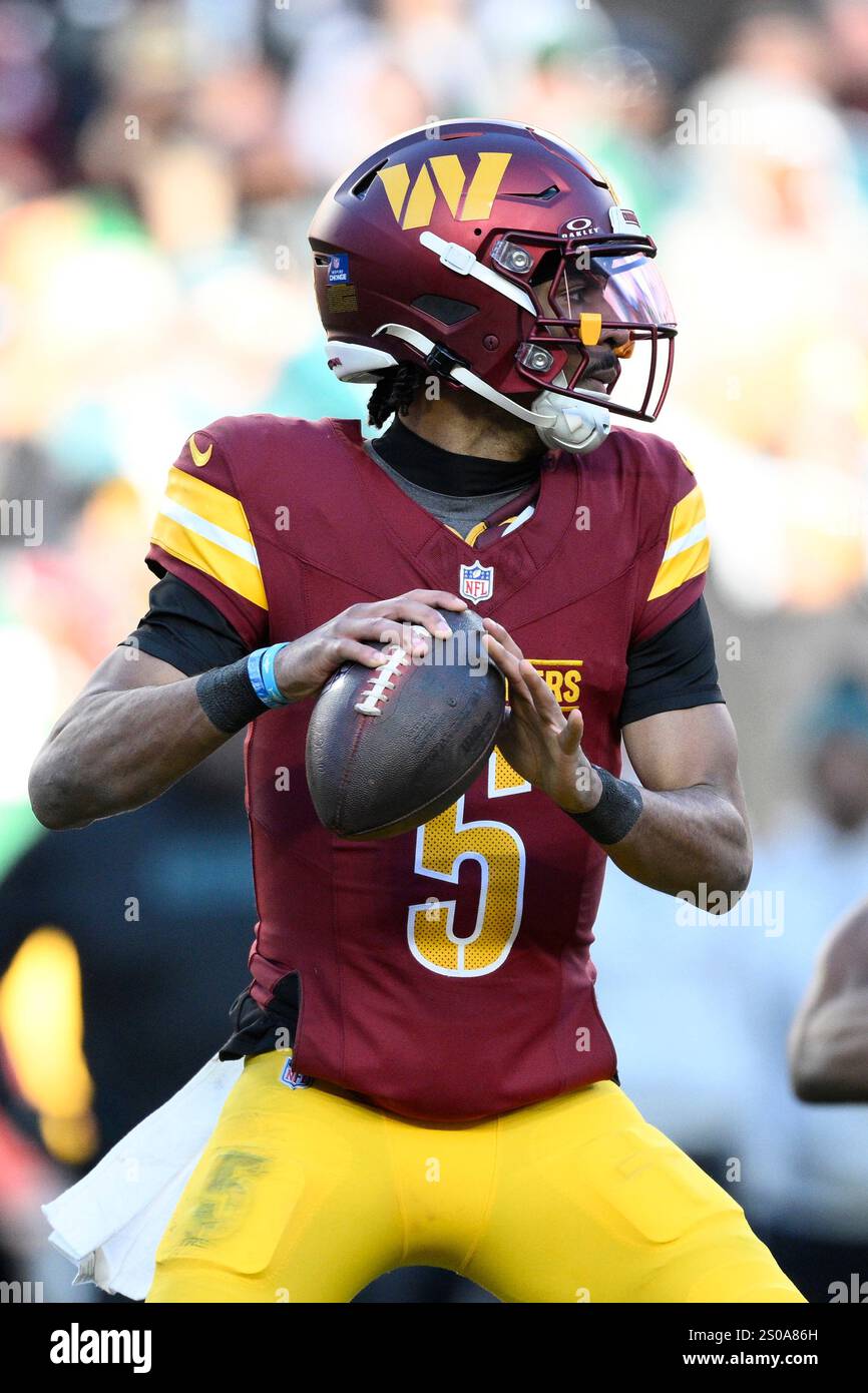 Washington Commanders quarterback Jayden Daniels (5) in action during ...
