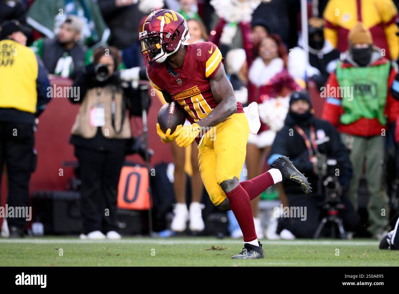 Washington Commanders wide receiver Olamide Zaccheaus (14) in action ...