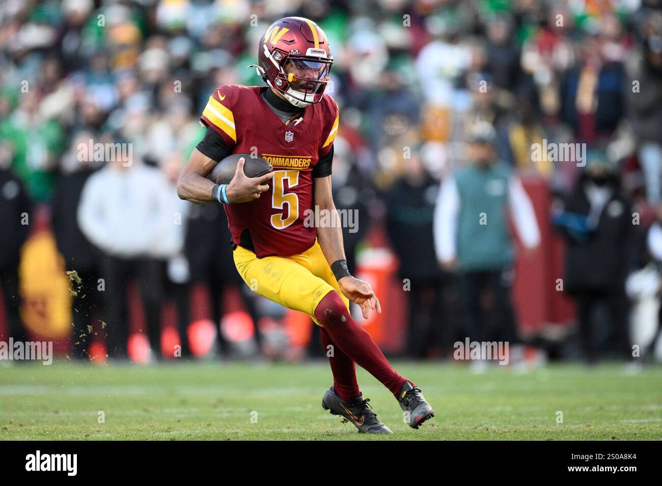Washington Commanders quarterback Jayden Daniels (5) in action during ...