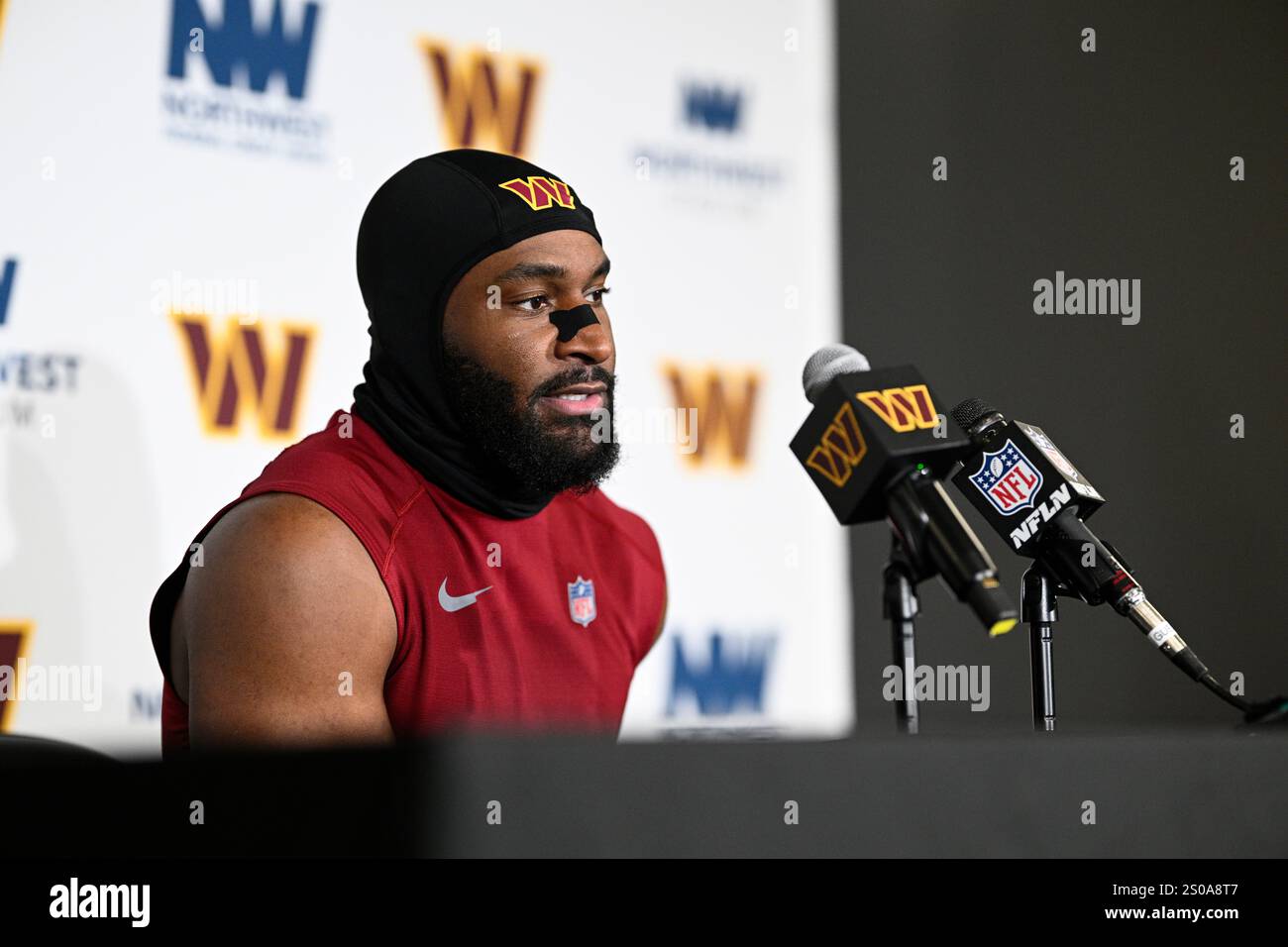 Washington Commanders wide receiver Jamison Crowder talks to the media ...