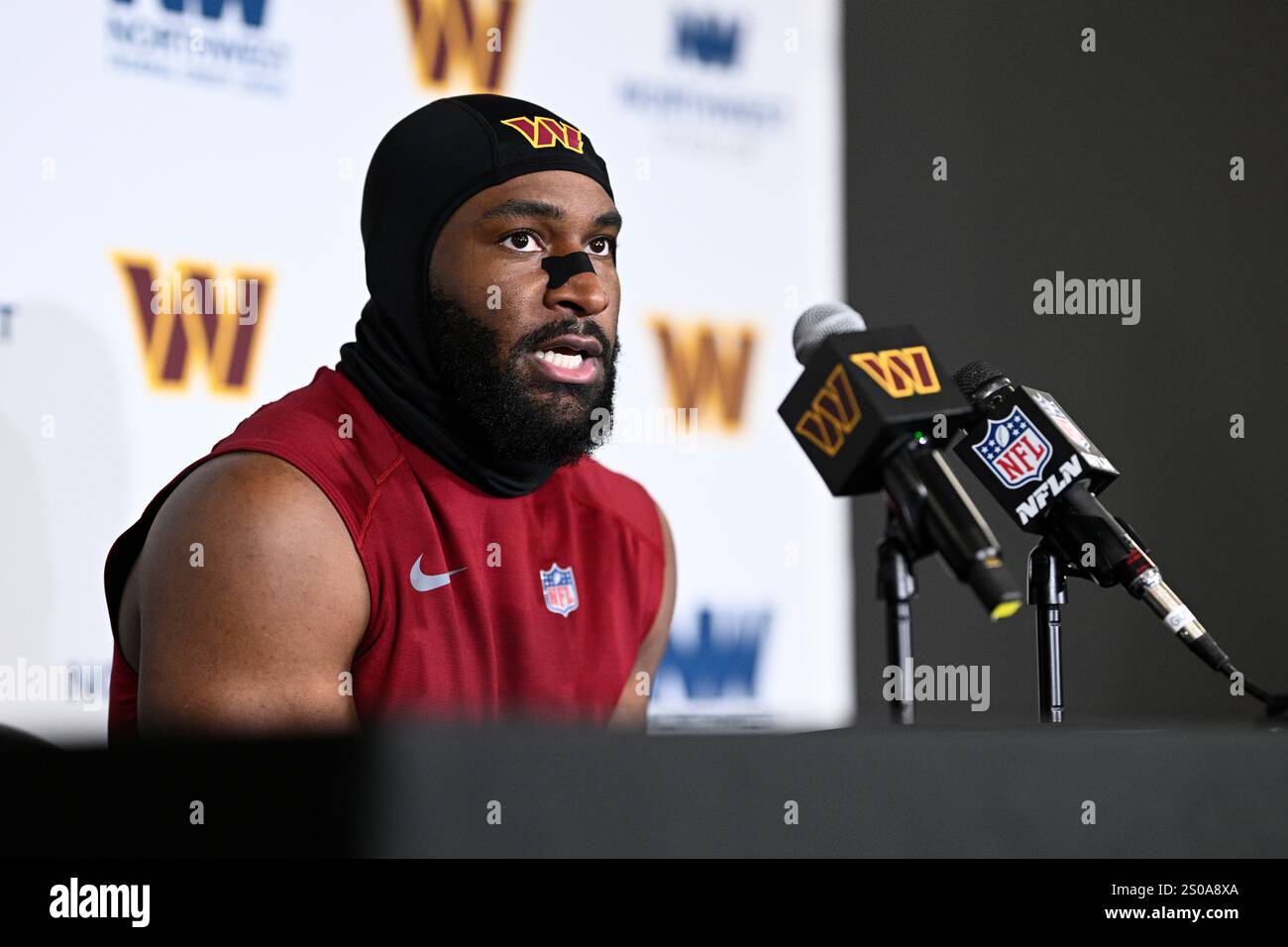Washington Commanders wide receiver Jamison Crowder talks to the media ...