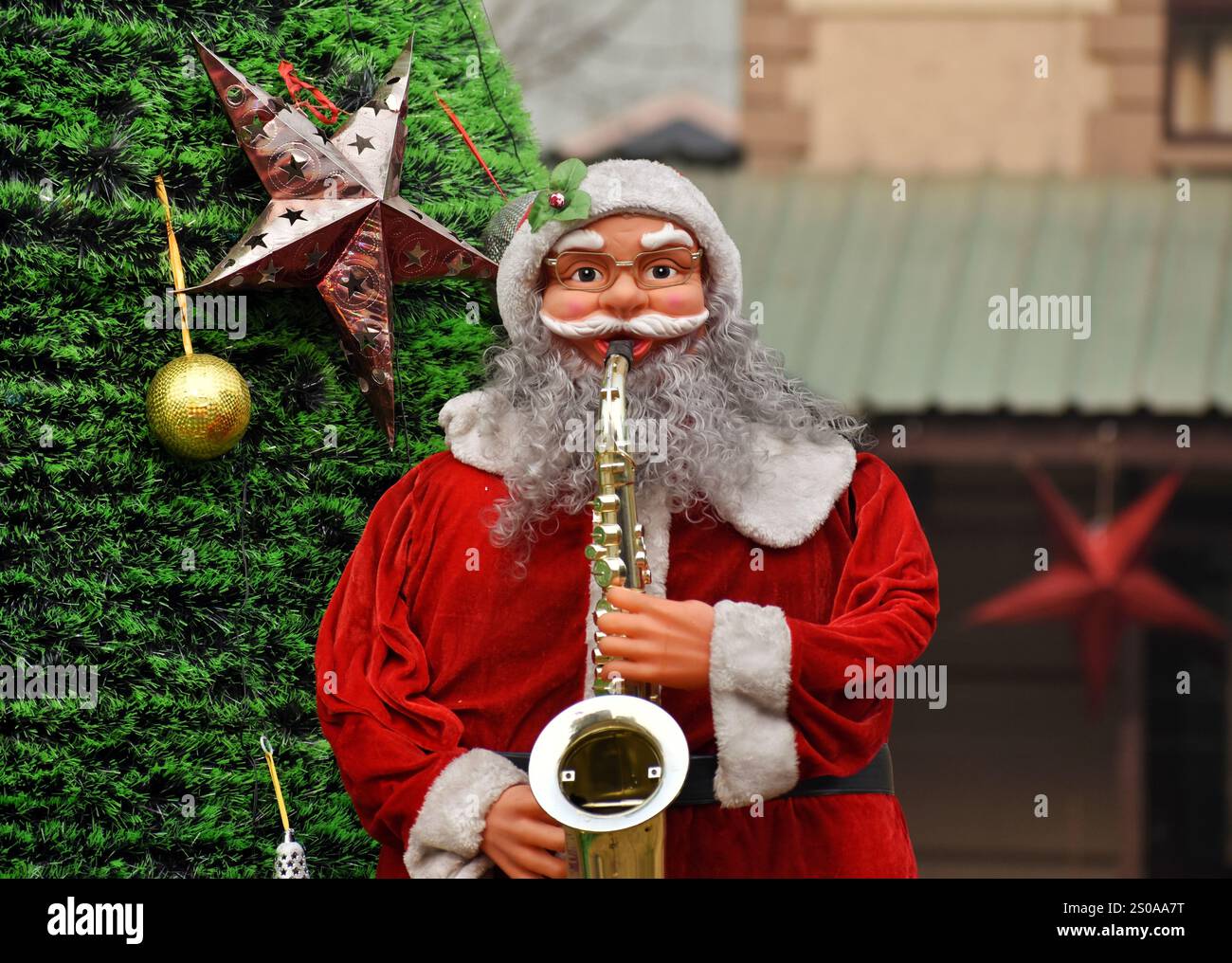A sculpture of Santa Claus during a mass in the Valley the Holy Family ...