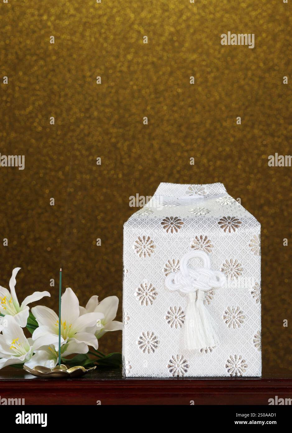 Close up of simple funeral scene in an ordinary Japanese household ...
