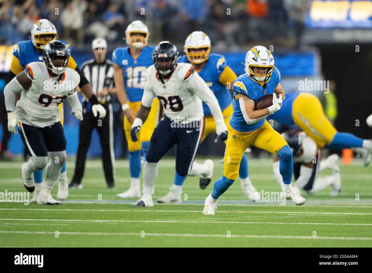 Los Angeles Chargers wide receiver Ladd McConkey (15) runs with the ...