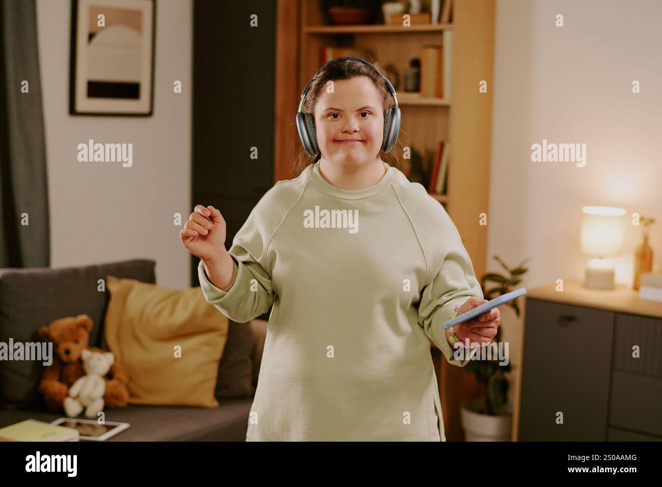 Girl With Disability In Headphones Dancing At Home Stock Photo - Alamy