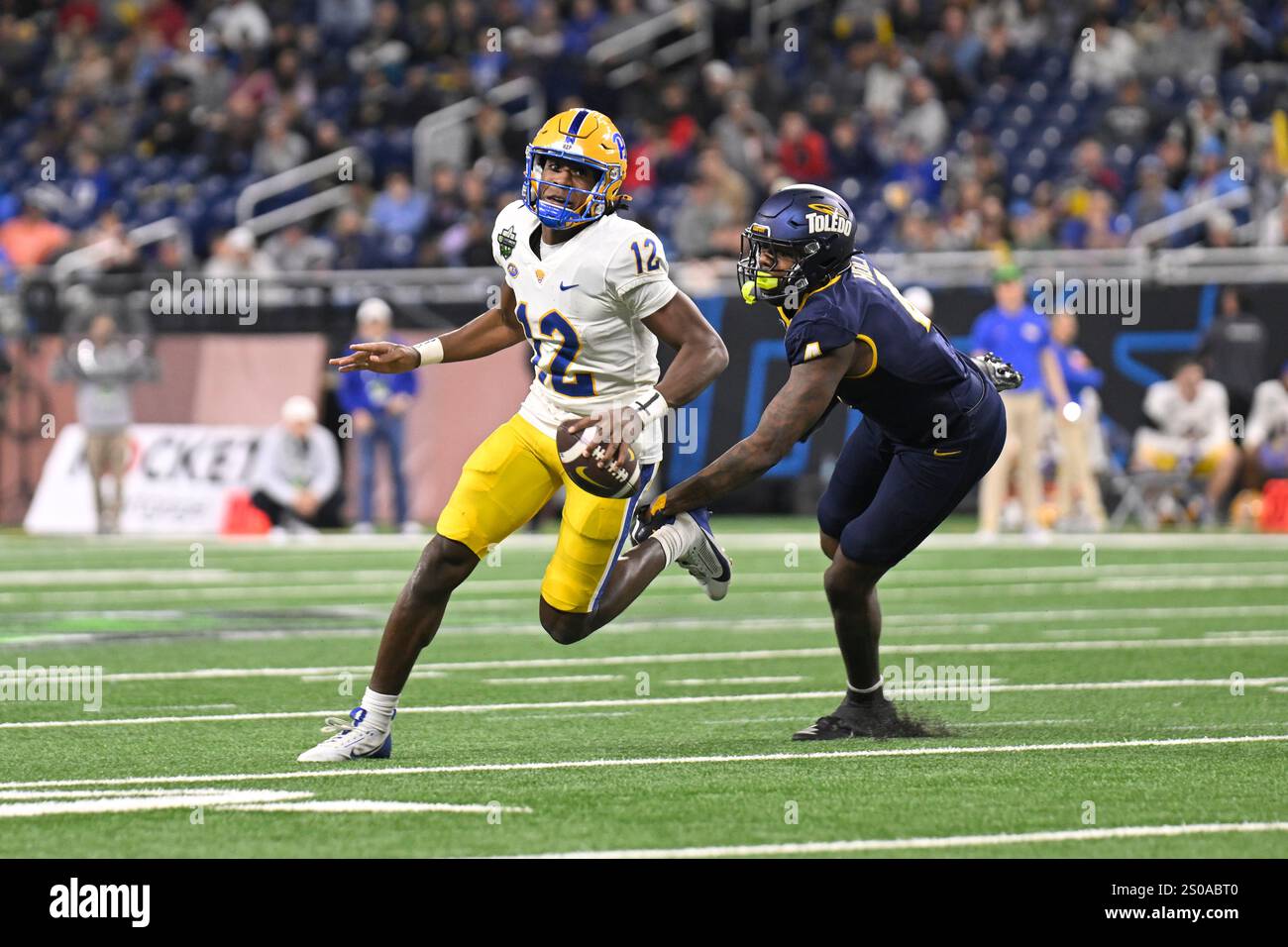 DETROIT, MI - DECEMBER 26: Pittsburgh Panthers QB Julian Dugger (12 ...