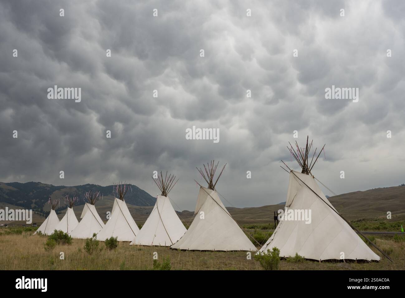 Textured Rain Clouds Build Over Seven Teepees On Display In Gardiner ...
