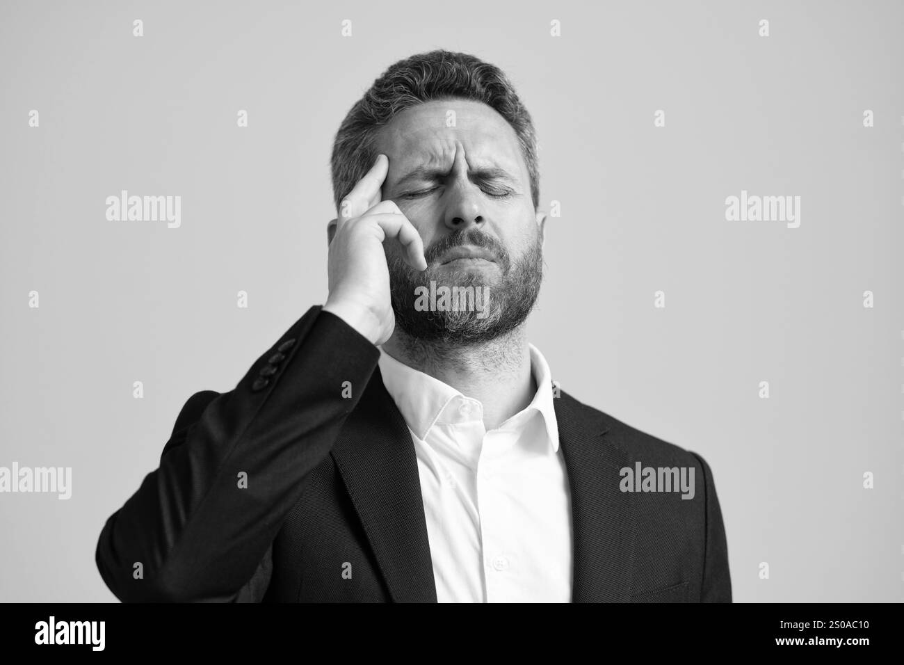 Headache and strain. Headache, tiredness and stress. Businessman in ...