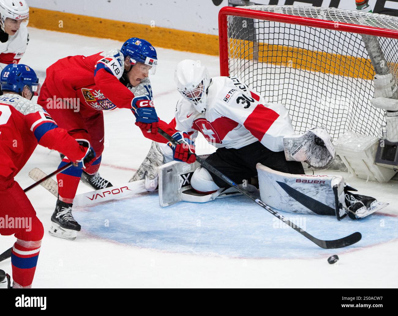 Ottawa, Canada. 26th Dec, 2024. Czechia forward Eduard Sale (12) losses ...